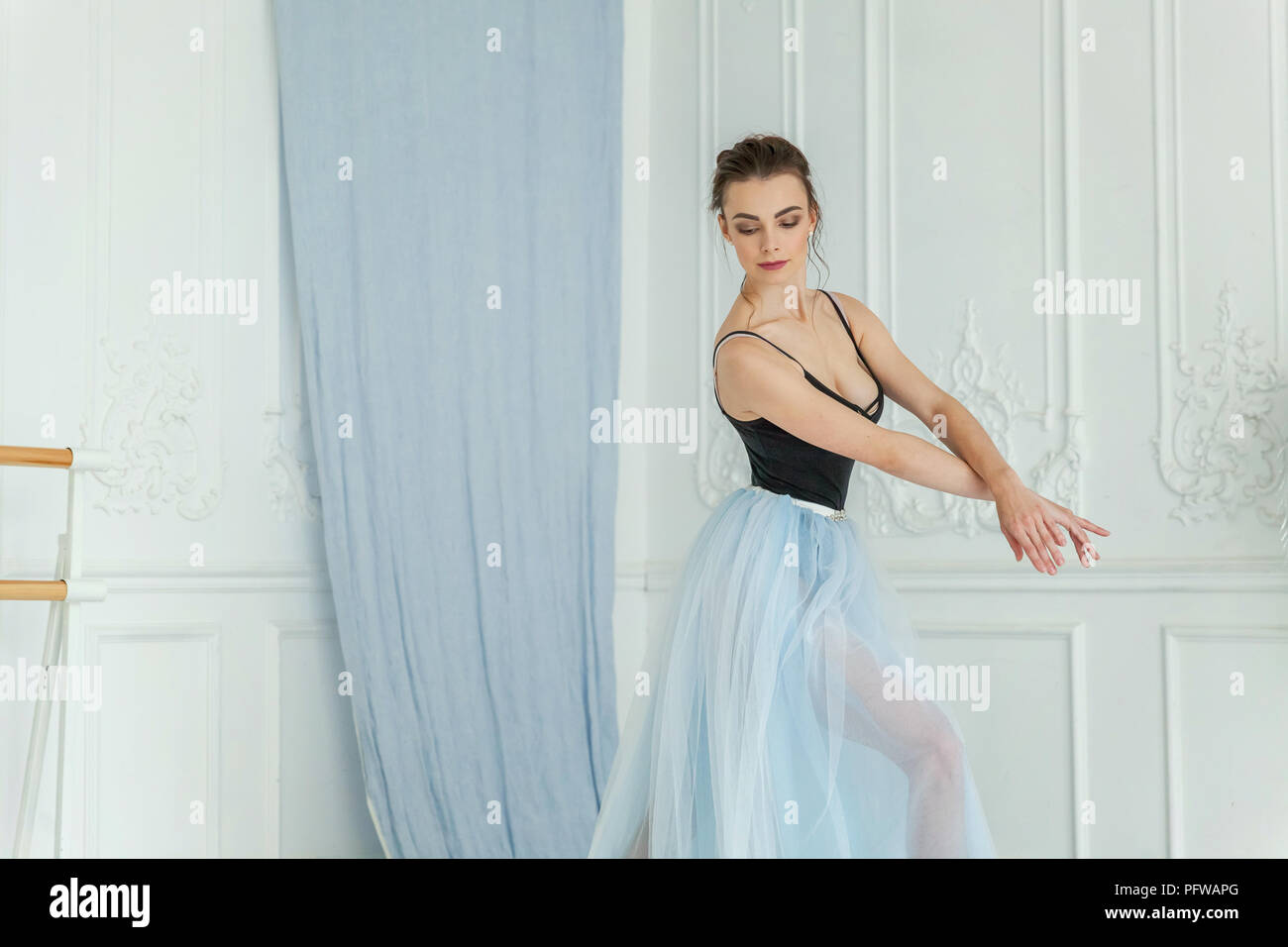 Young classical Ballet dancer side view. Beautiful graceful ballerine ...