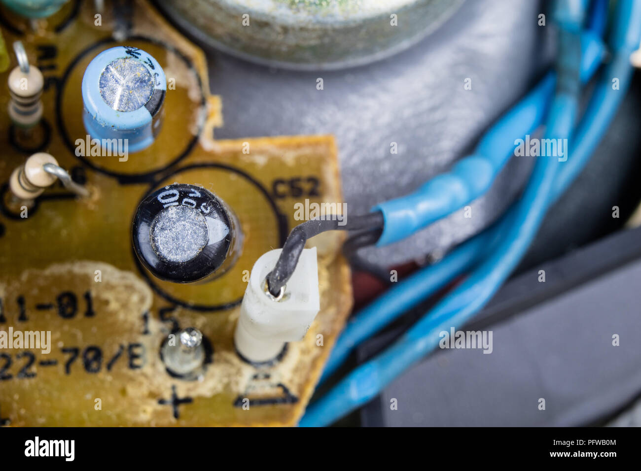 Old integrated circuits in an analog radio receiver. Resistors ...