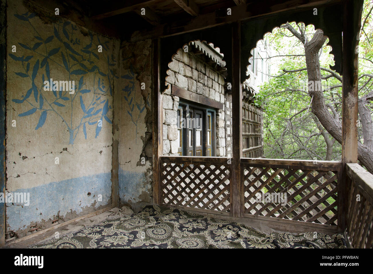 A wooden veranda at Khan's Palace, Turtuk village, Shyok valley, Ladakh ...