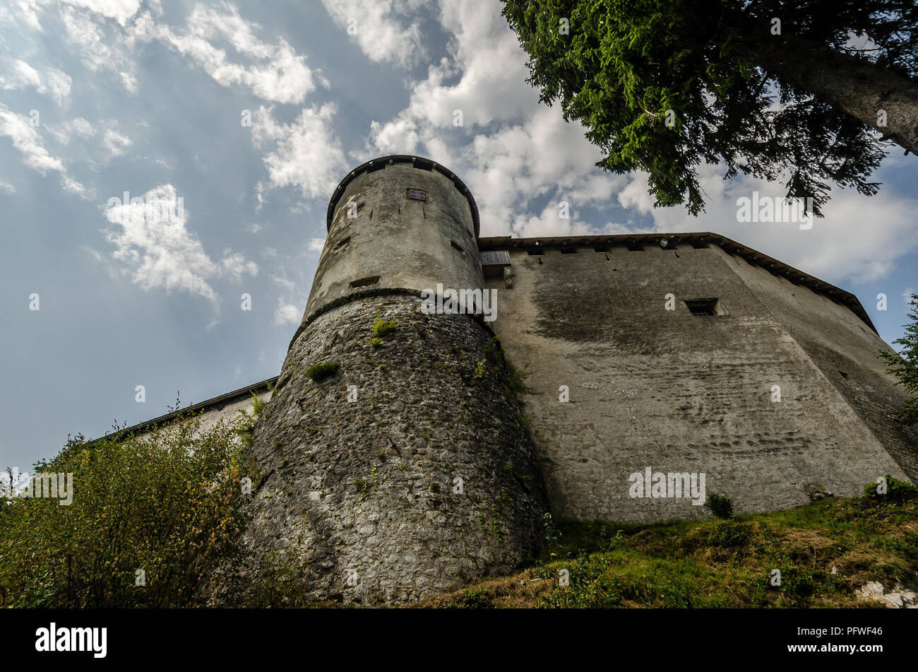 High prison wall and tower Stock Photo - Alamy