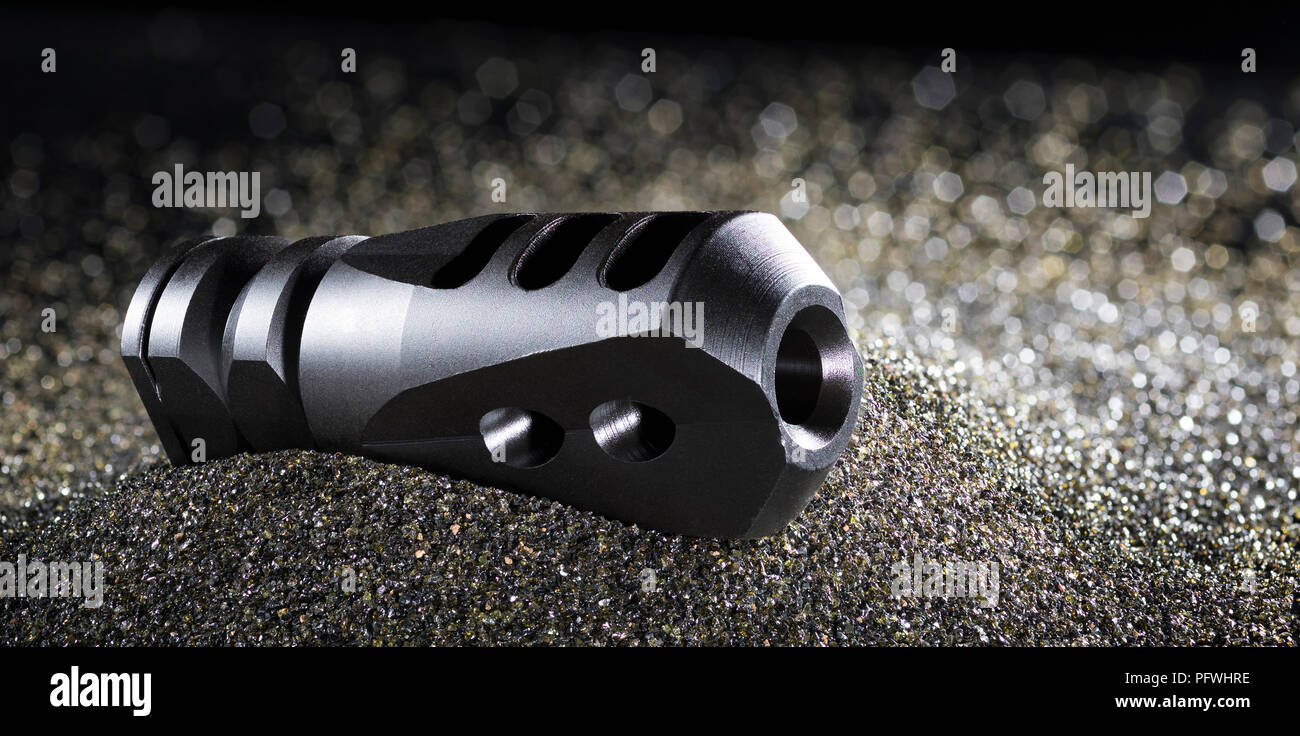 Device used to reduce recoil on an assault rifle Stock Photo - Alamy