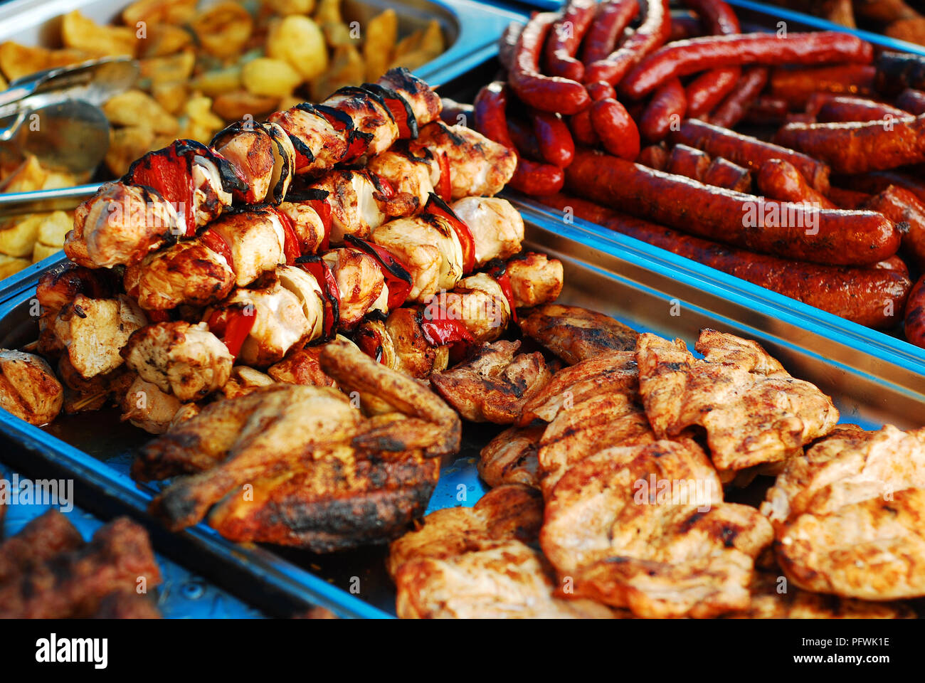 roasted meat at the food market Stock Photo - Alamy
