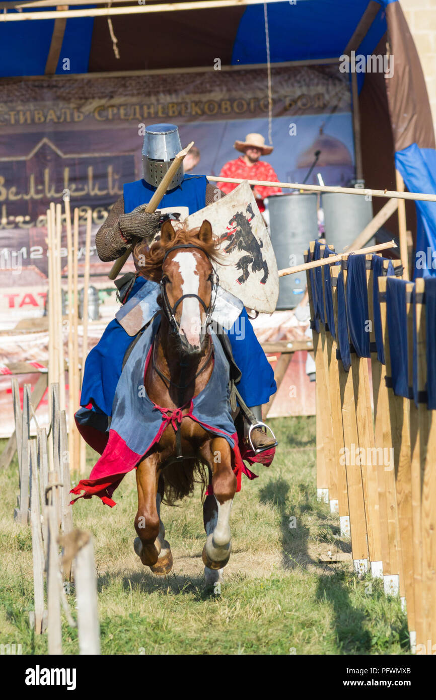 Bulgar, Russian Federation - August 2018, - a man in blue knight's ...