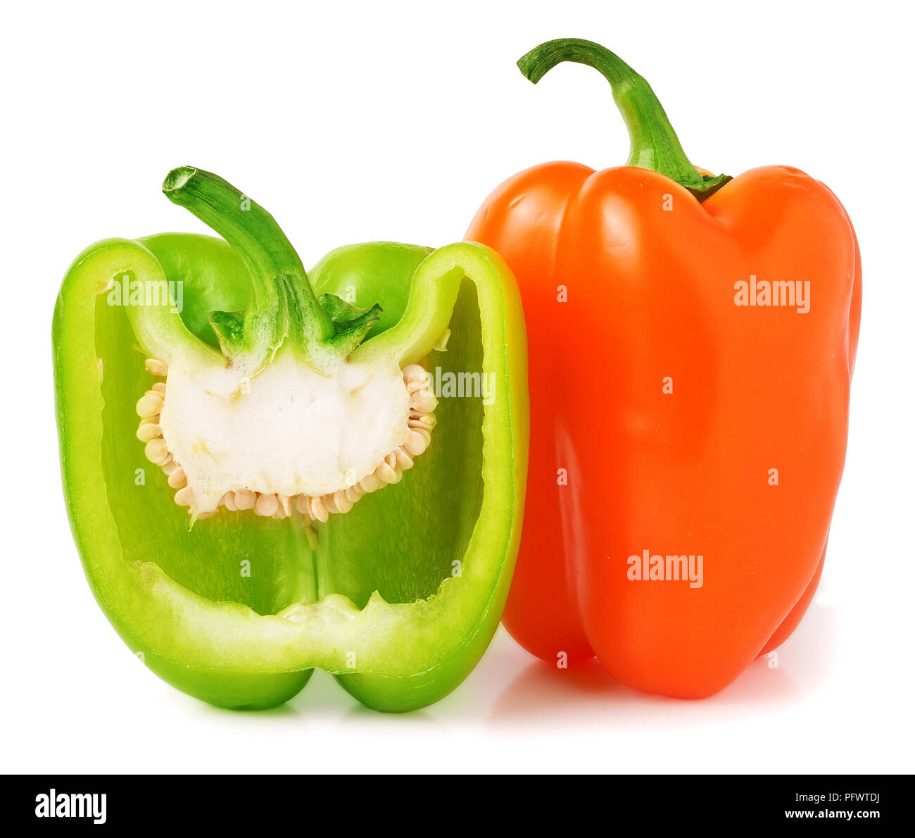 colored peppers over white background Stock Photo - Alamy