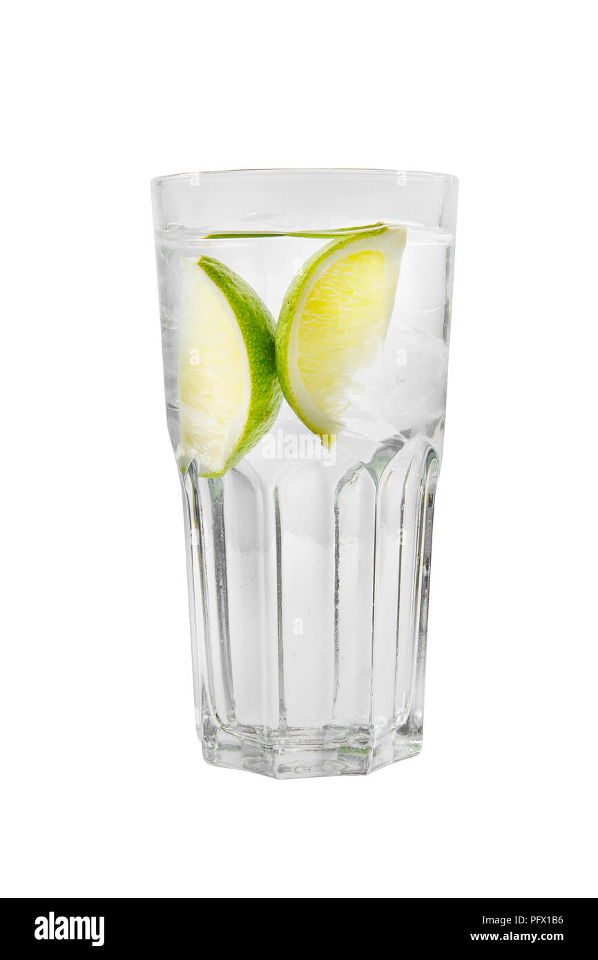 Transparent cocktail in a tall glass with ice cubes with two slices ...