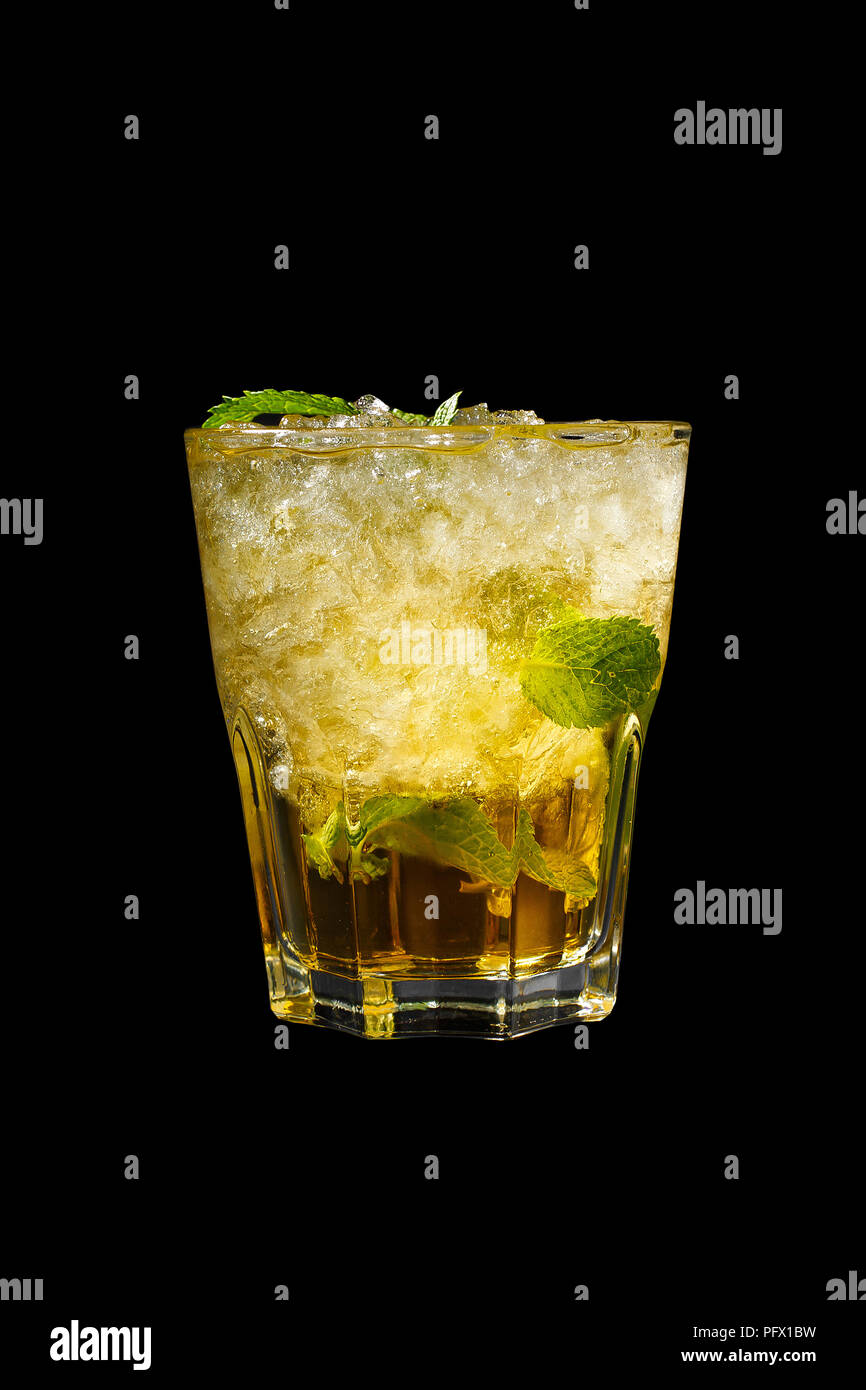 Transparent one-color cocktail in a low glass with crushed ice frappe ...