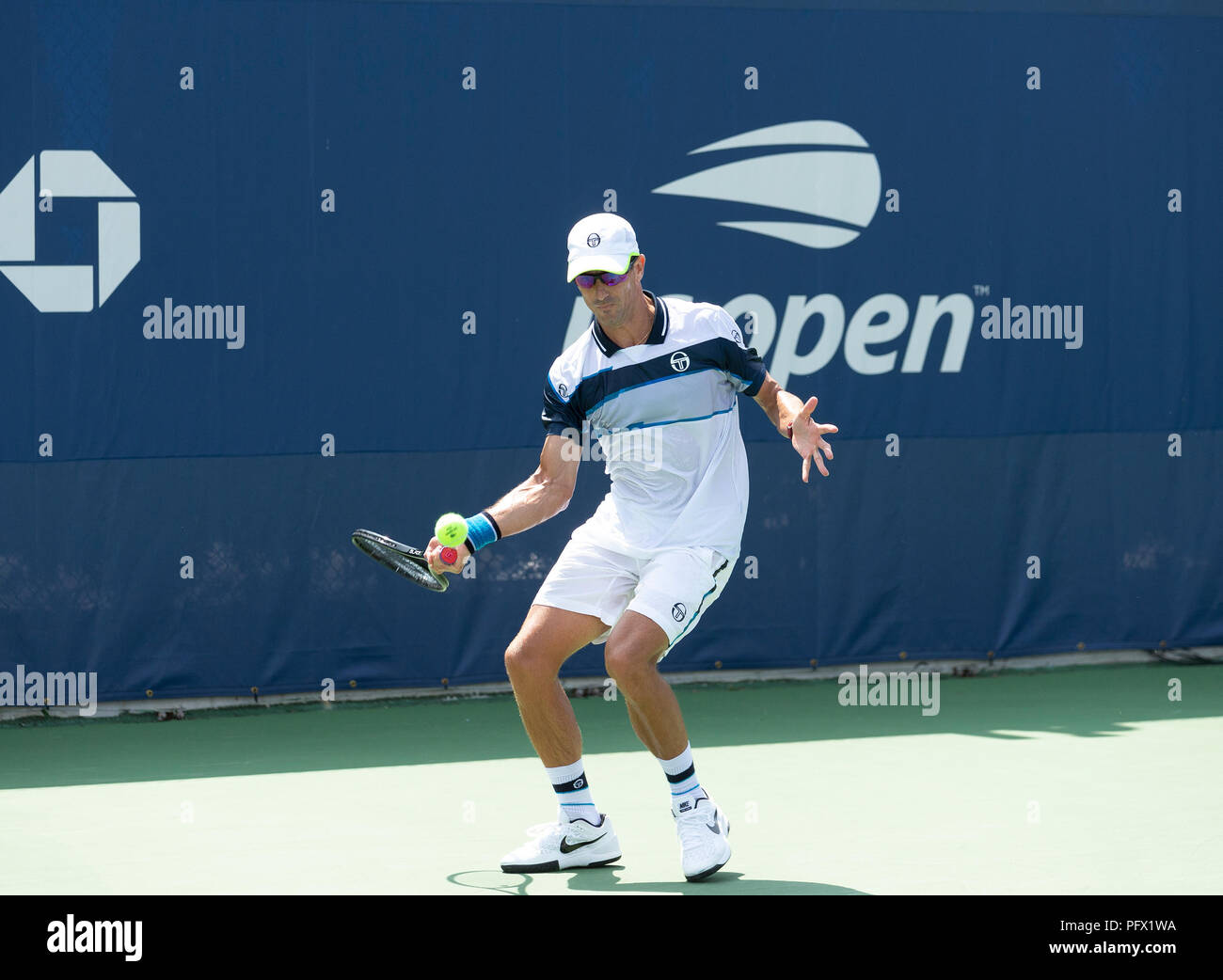 New York, United States. 21st Aug, 2018. Tommy Robredo of Spain returns ...