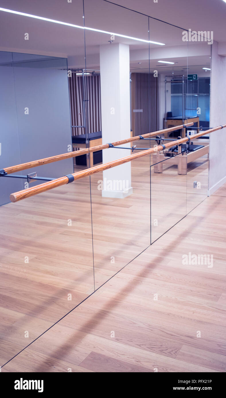 Pilates fitness studio gym room with training dance ballet bar for ...