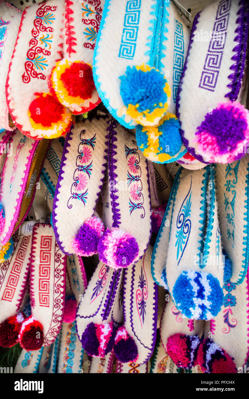 Greek slippers with pompoms in Athens Stock Photo - Alamy