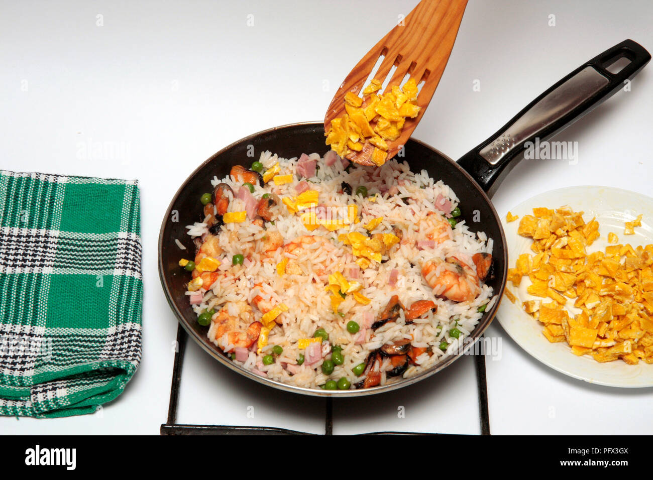 Four delights rice. Step by step. Prepared dish: BK6JNB Stock Photo - Alamy