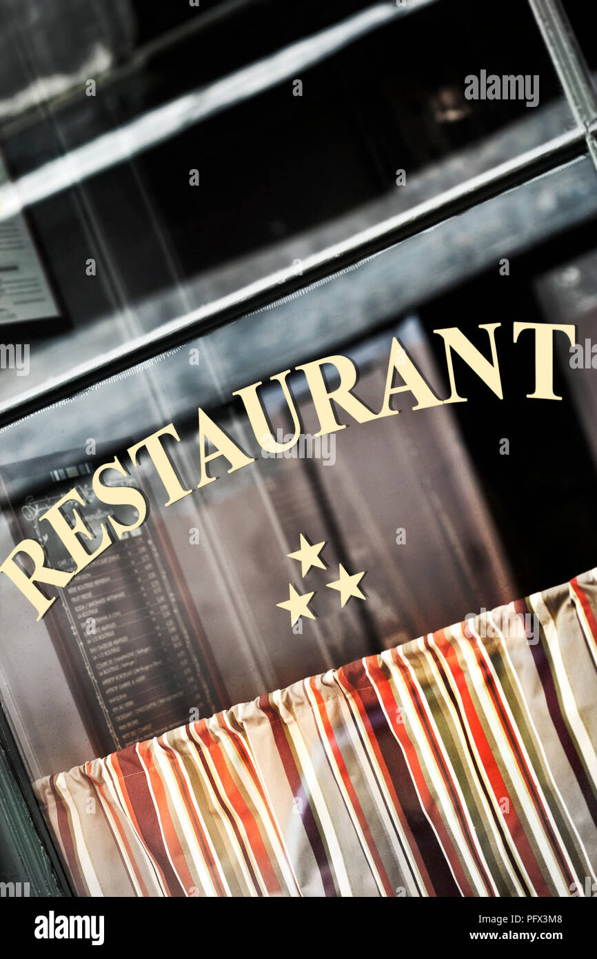 Window of a typical French bistro in Paris Stock Photo - Alamy