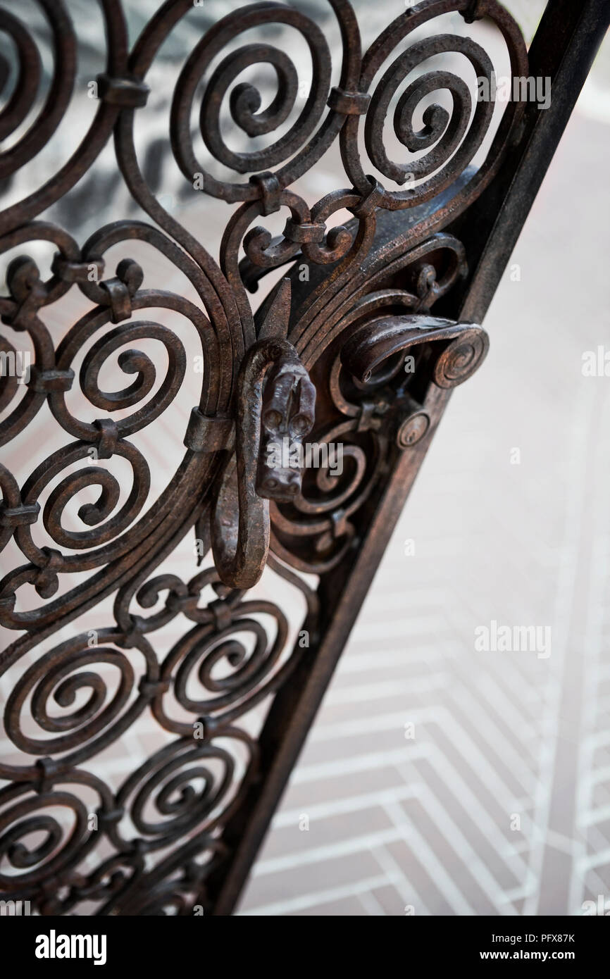 Wrought iron gate courtyard in hi-res stock photography and images - Alamy