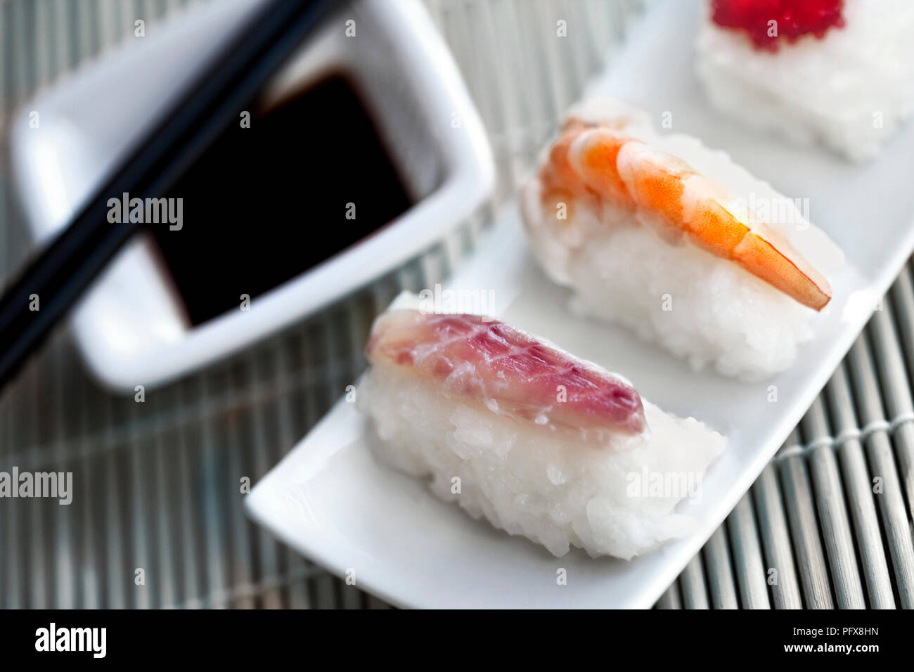 Shrimp and fish sushi on the table of an asian restaurant Stock Photo ...