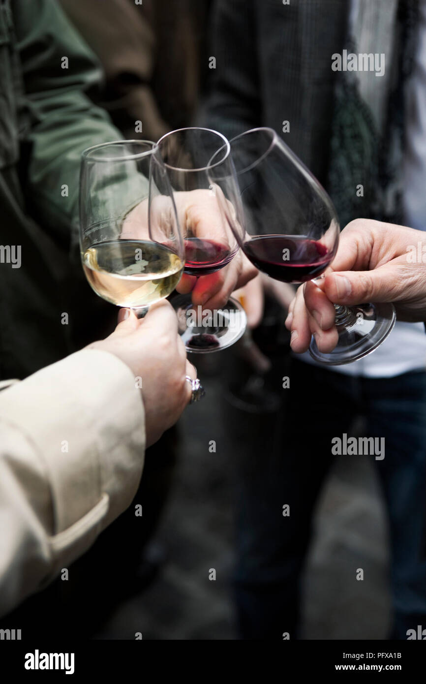 Group of people tasting red wine in a winery Stock Photo - Alamy