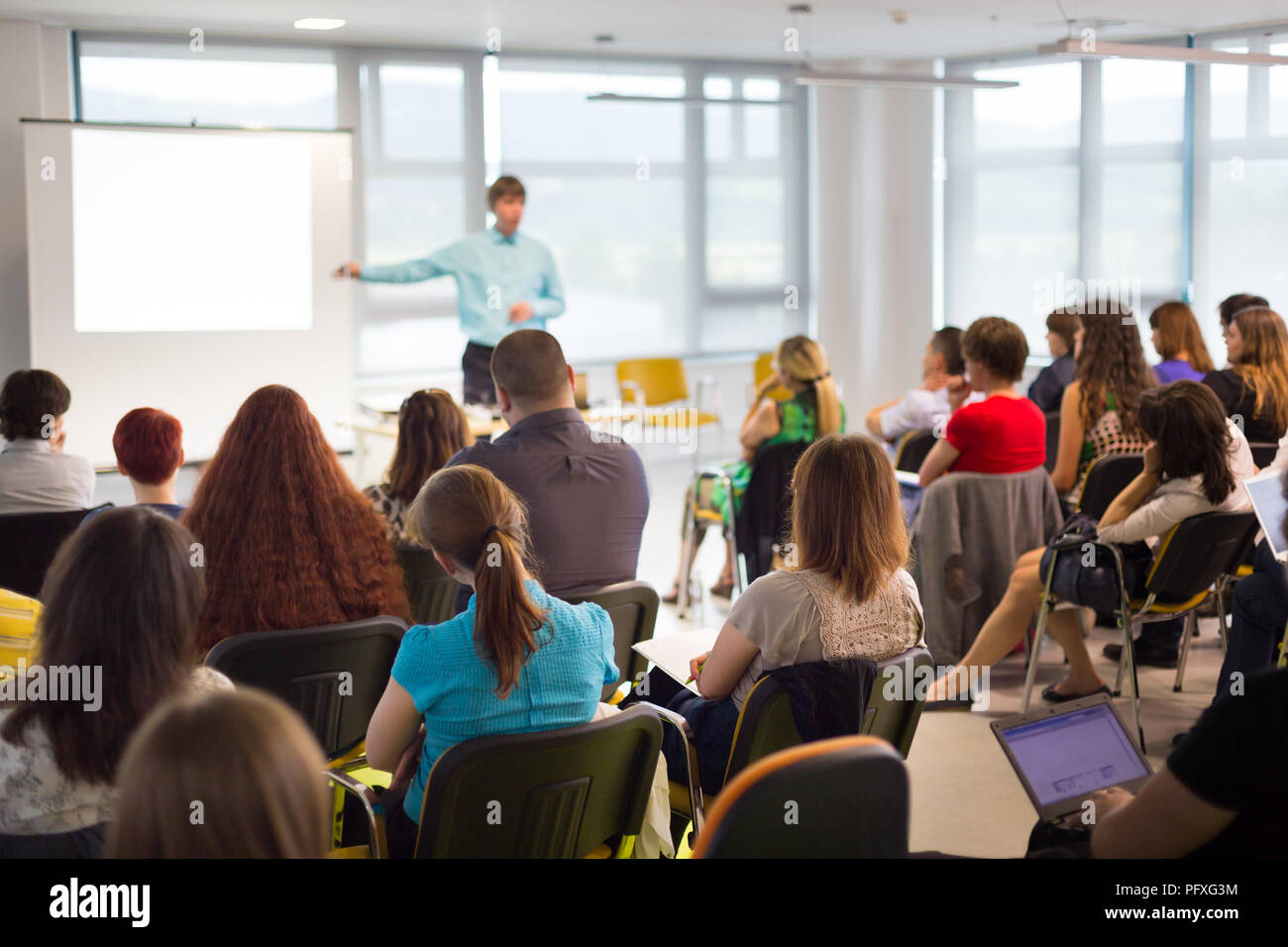 Speaker giving presentation on business conference Stock Photo - Alamy