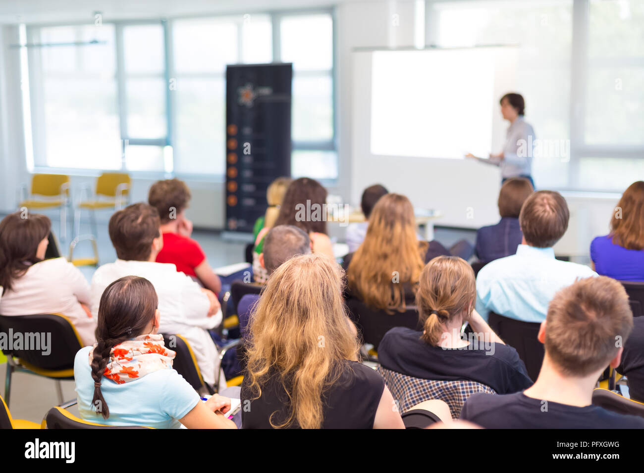 Speaker giving presentation on business conference Stock Photo - Alamy