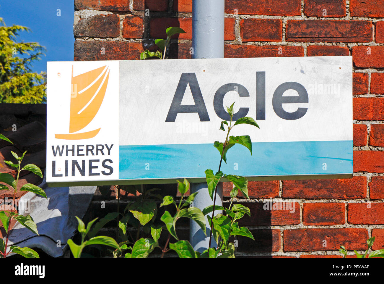 The sign for the railway station on the Wherry Lines at Acle, Norfolk ...