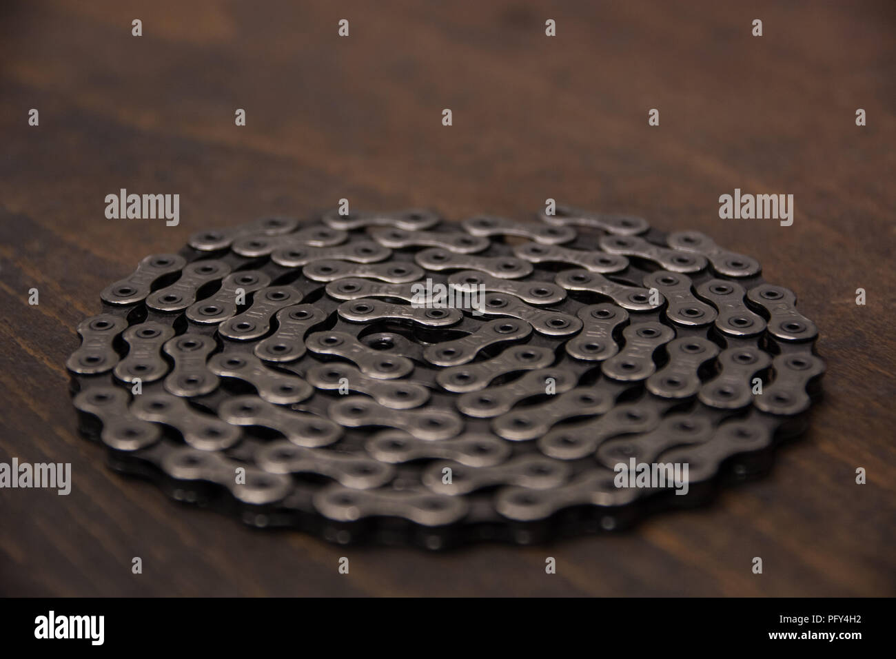 Rolled chain up workbench Stock Photo - Alamy
