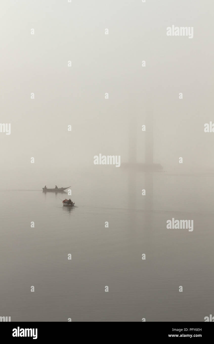 Small fishing boats in activity on the Douro River near one of his ...