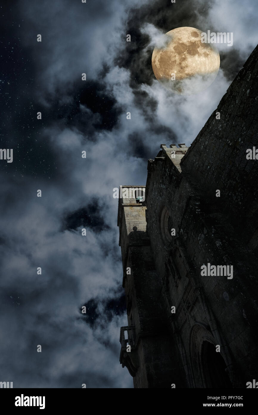 Medieval church at a full moon night with clouds and stars Stock Photo ...