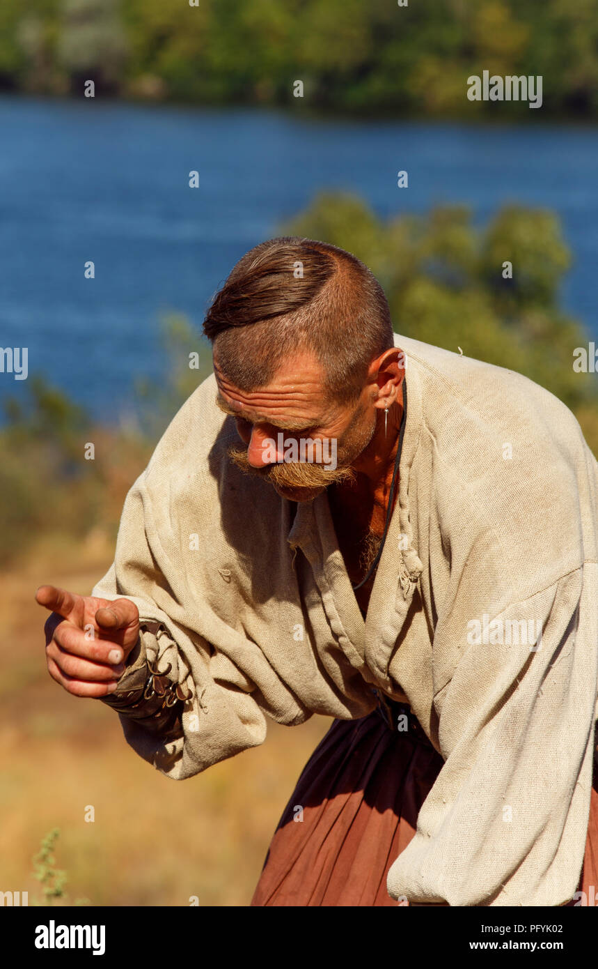 Old Cossack points to something with your finger on the island of ...