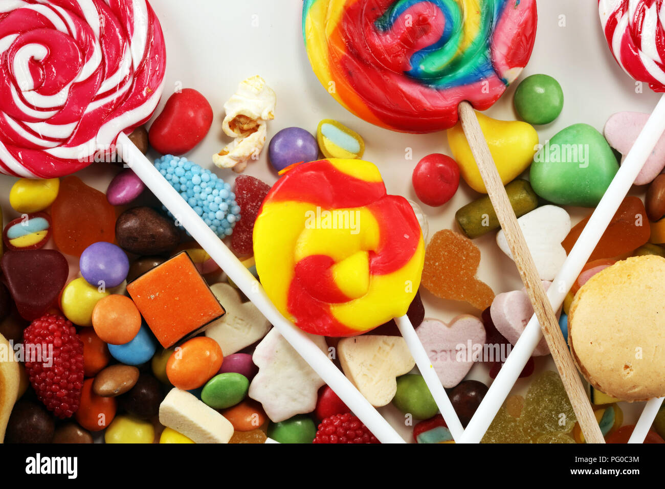 candies with jelly and sugar. colorful array of different childs sweets and treats Stock Photo ...