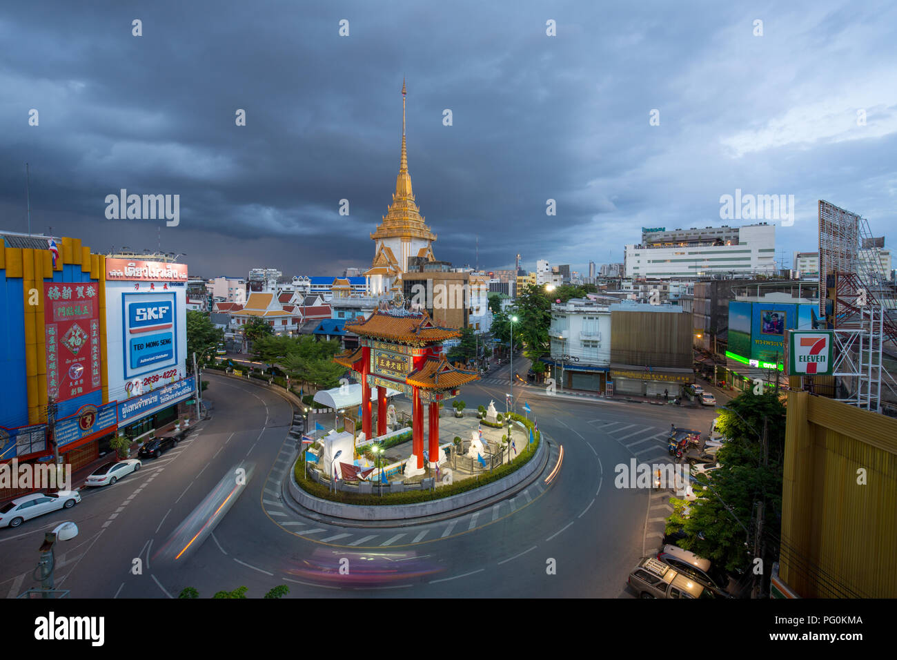a big asia city by night to the sunrise with all the lights on the ...