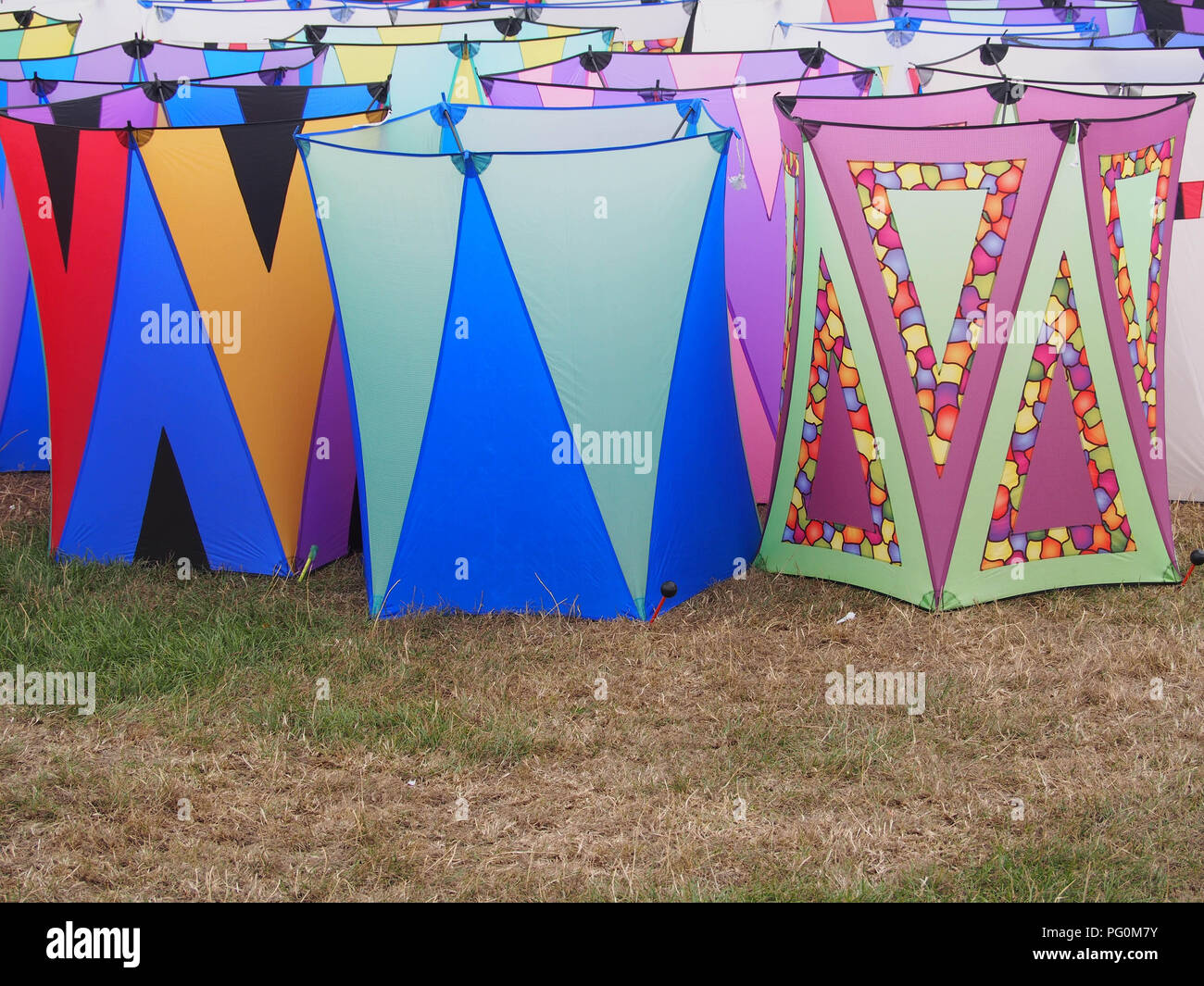 Decorated fabric of box kites sitting on the ground Stock Photo - Alamy