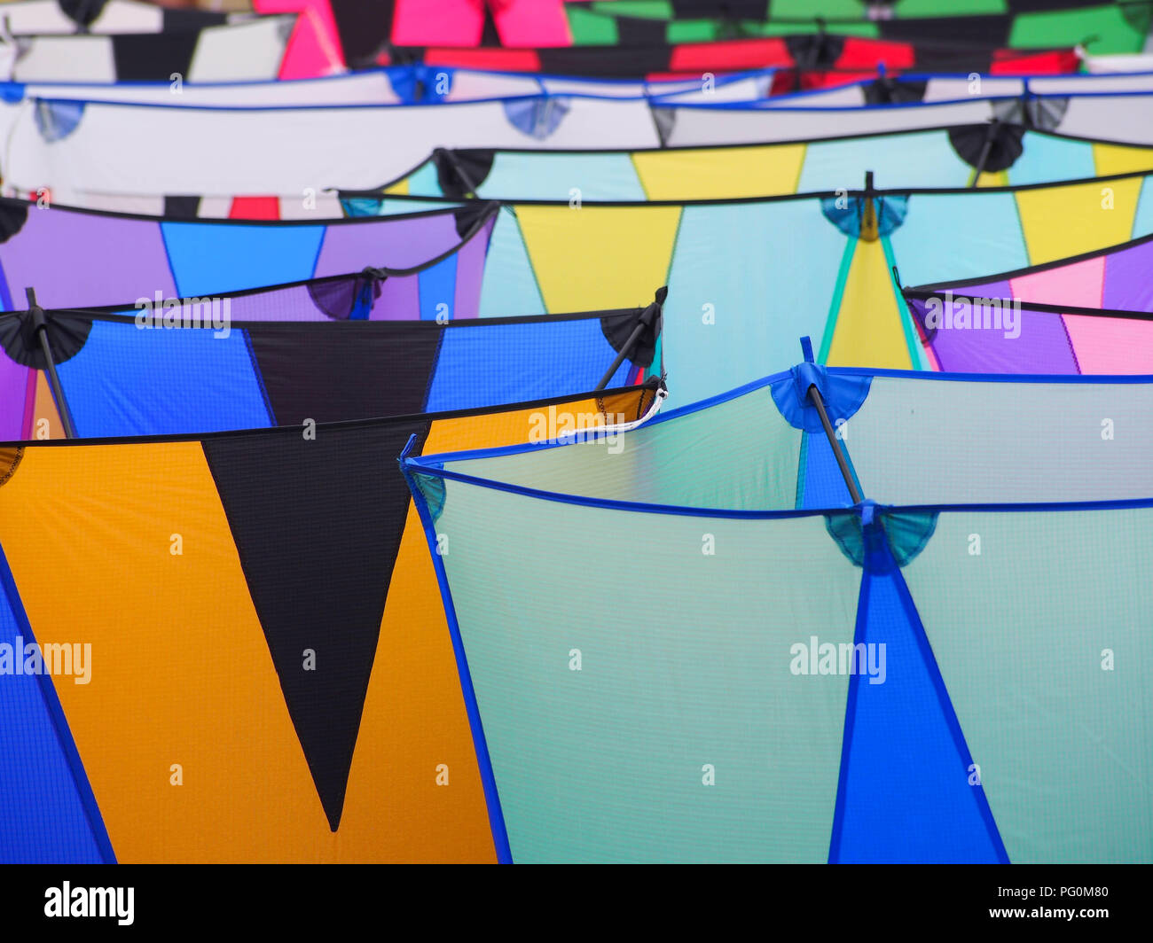 Decorated fabric of box kites sitting on the ground Stock Photo - Alamy