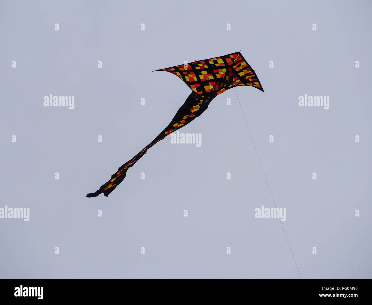 Flying wind windy kites hi-res stock photography and images - Alamy