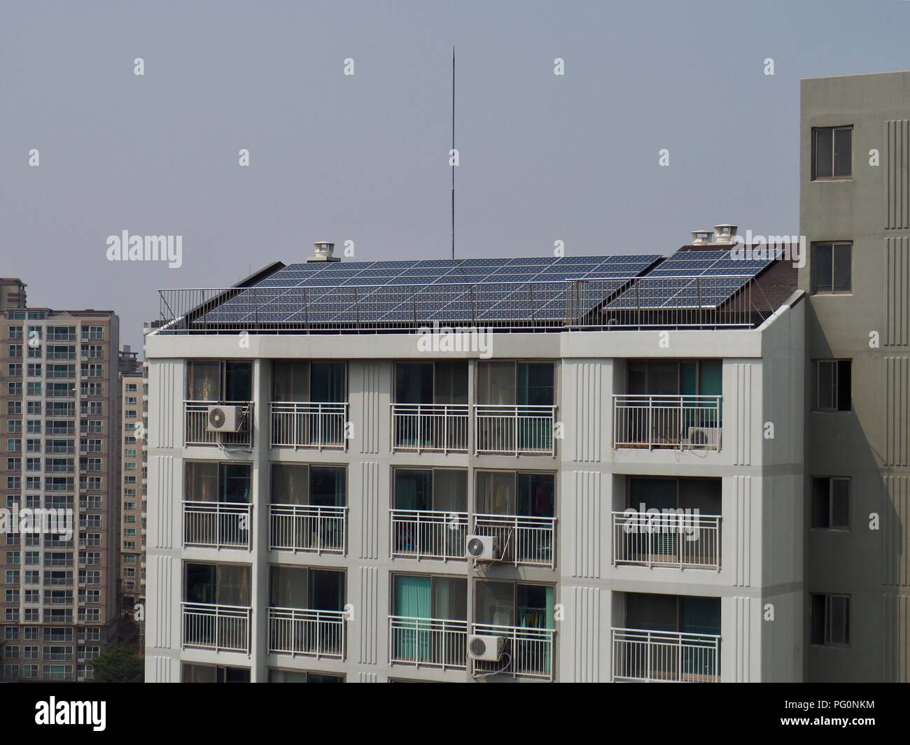 Asia city solar panels roof hi-res stock photography and images - Alamy