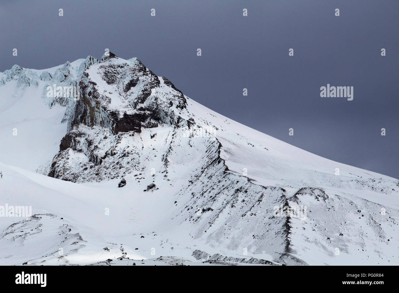 Snow covered mountain ridge Stock Photo - Alamy