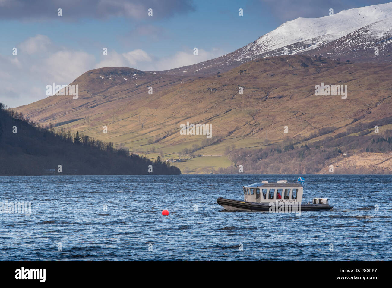 Loch Tay Safaris,Kenmore , Loch Tay, Scotland. A tourist boat pictured ...