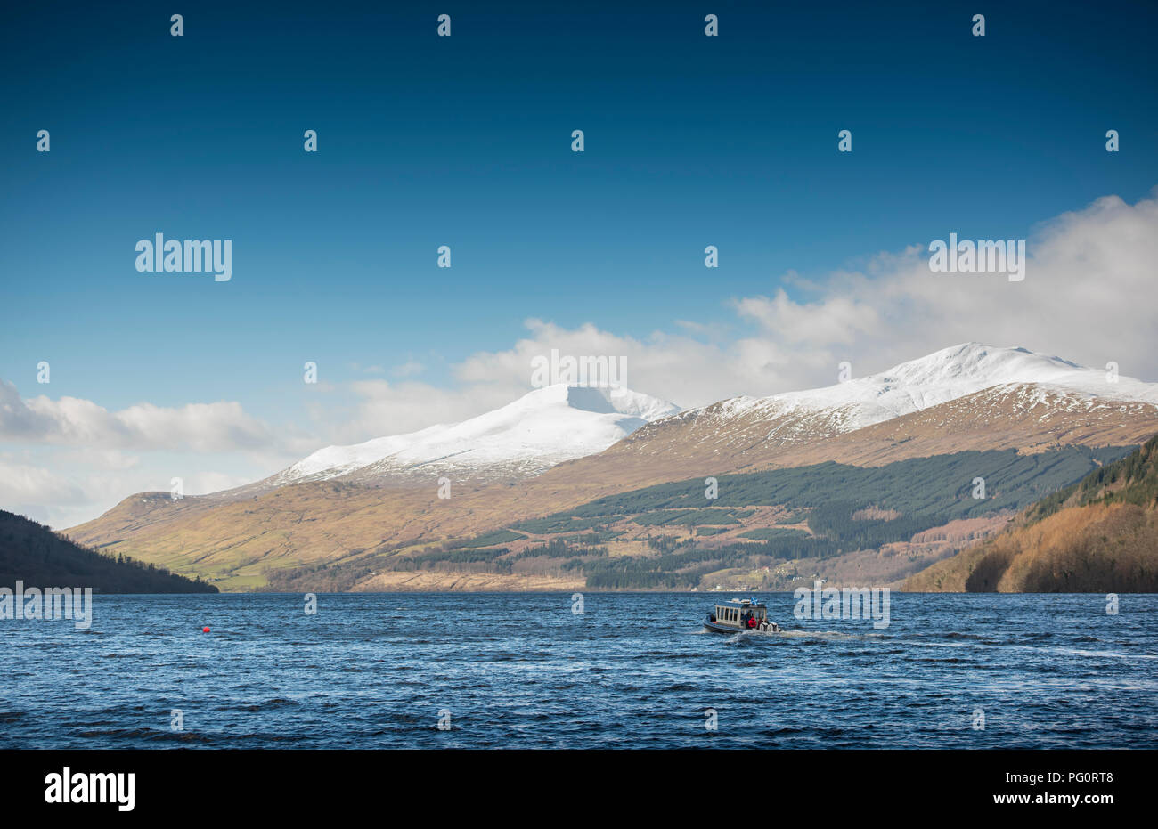 Loch Tay Safaris,Kenmore , Loch Tay, Scotland. A tourist boat pictured ...