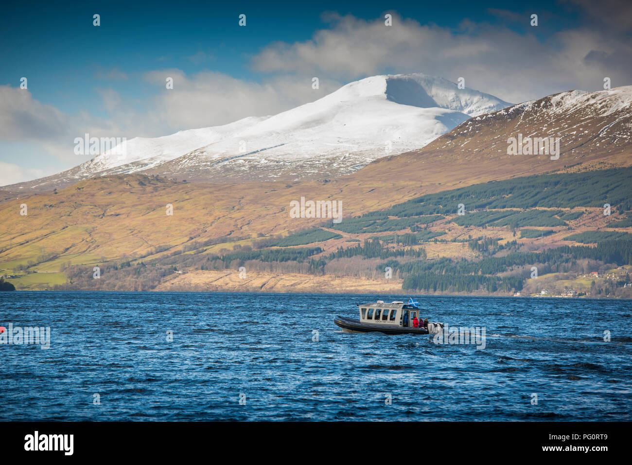 Loch Tay Safaris,Kenmore , Loch Tay, Scotland. A tourist boat pictured ...