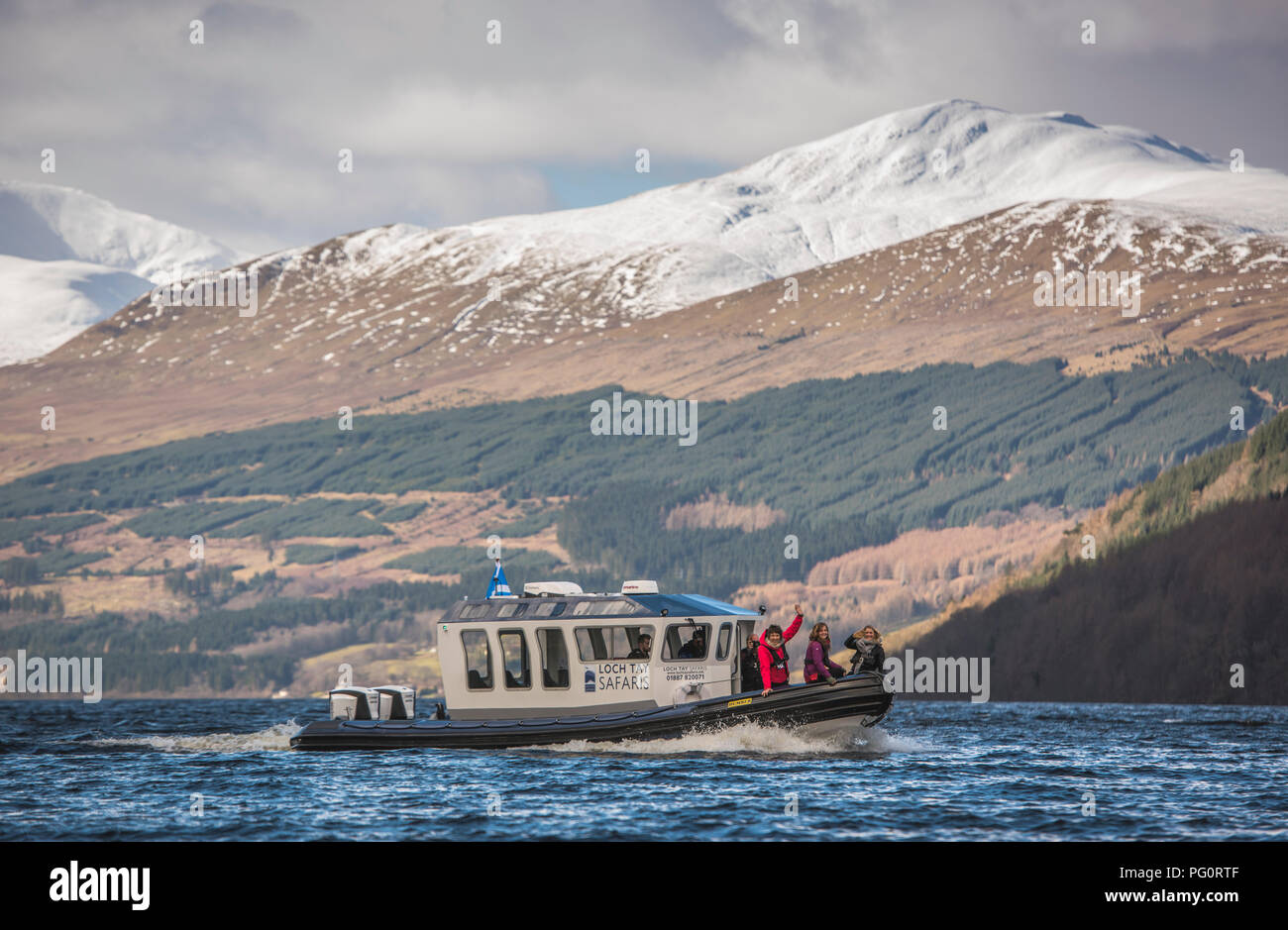 Loch Tay Safaris,Kenmore , Loch Tay, Scotland. A tourist boat pictured ...