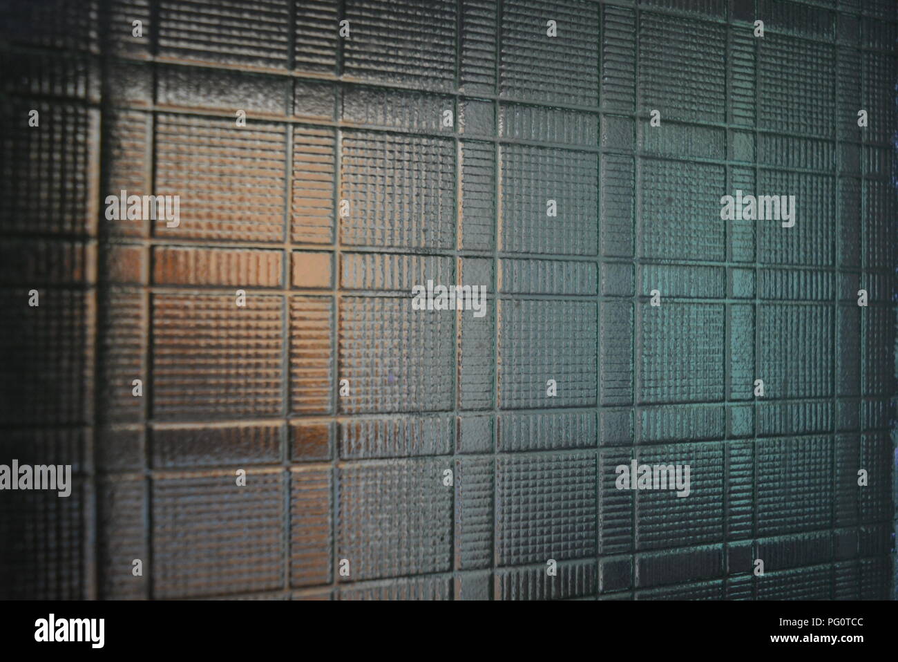 Glass dented background in the form of square wafers, squares and ...