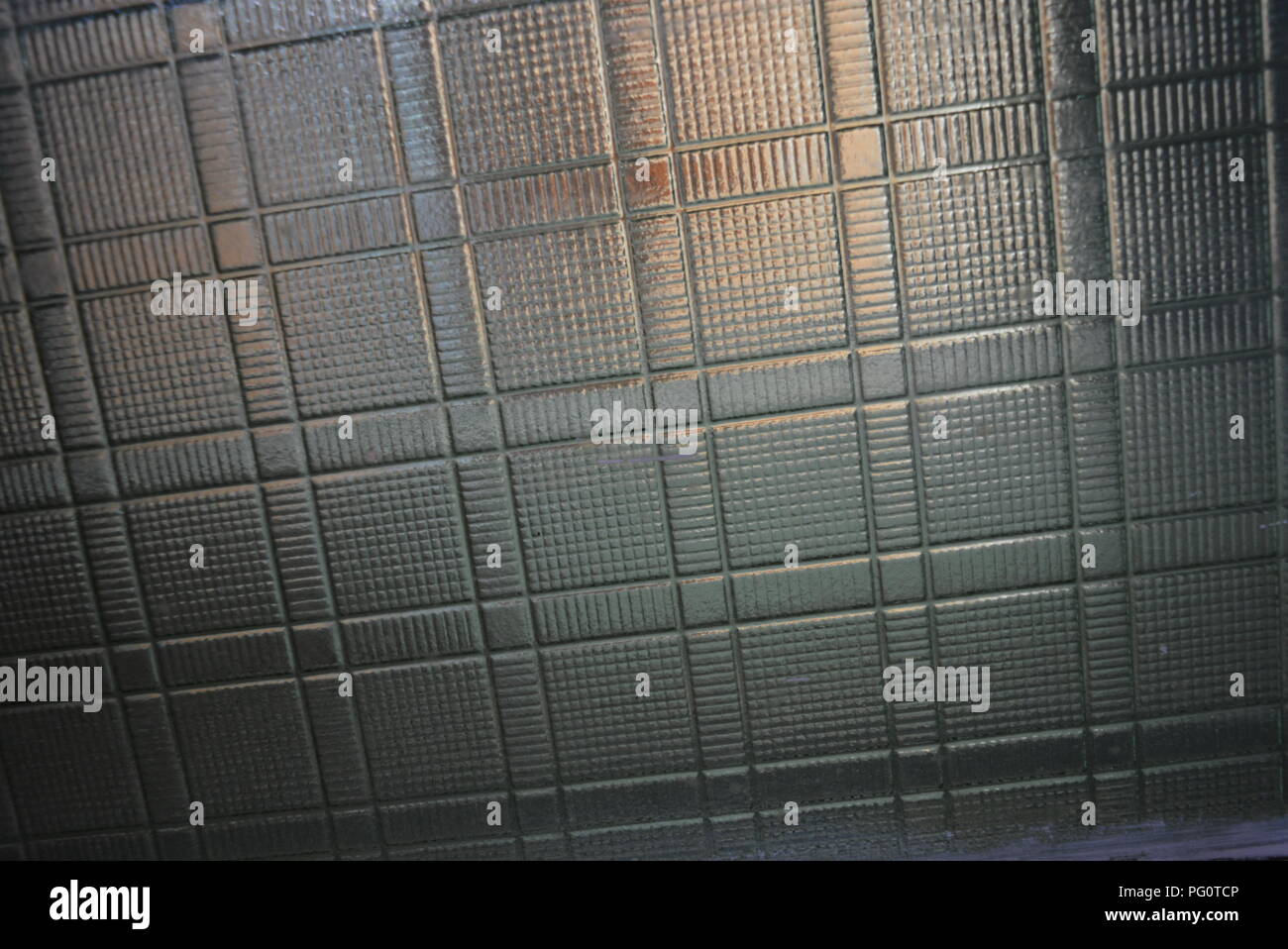Glass dented background in the form of square wafers, squares and ...