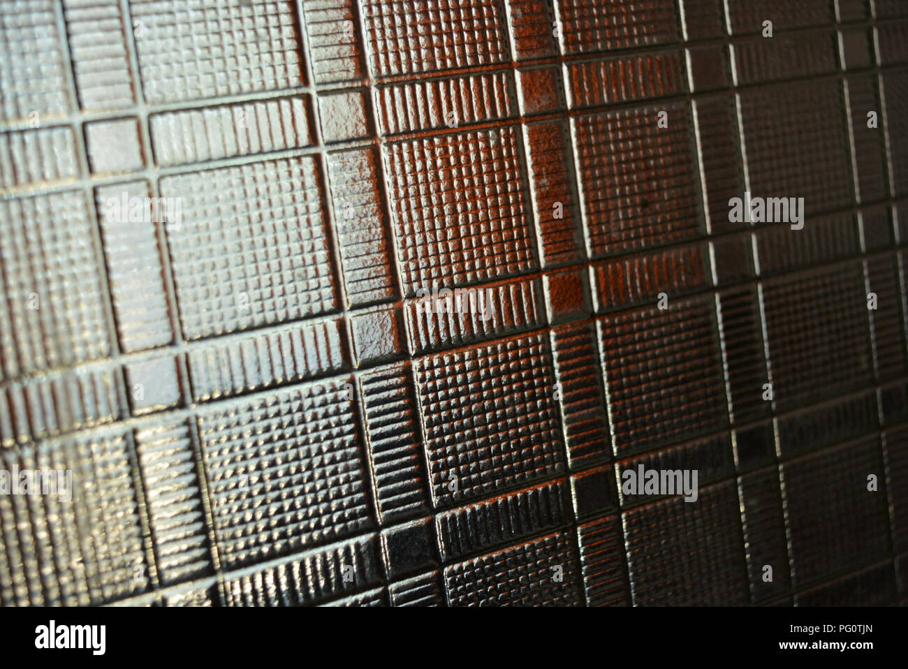 Glass dented background in the form of square wafers, squares and ...