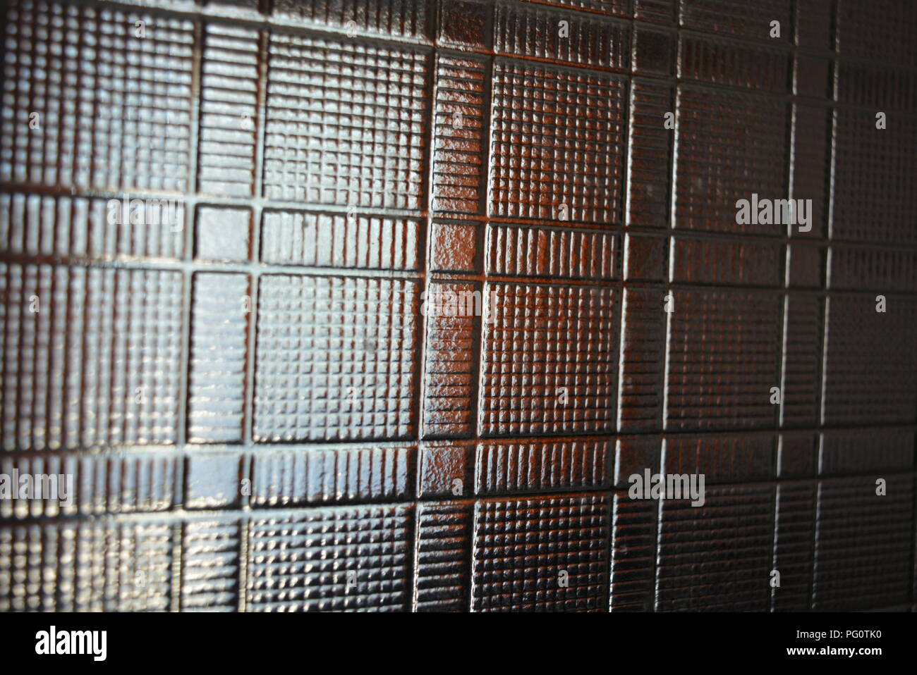 Glass dented background in the form of square wafers, squares and ...