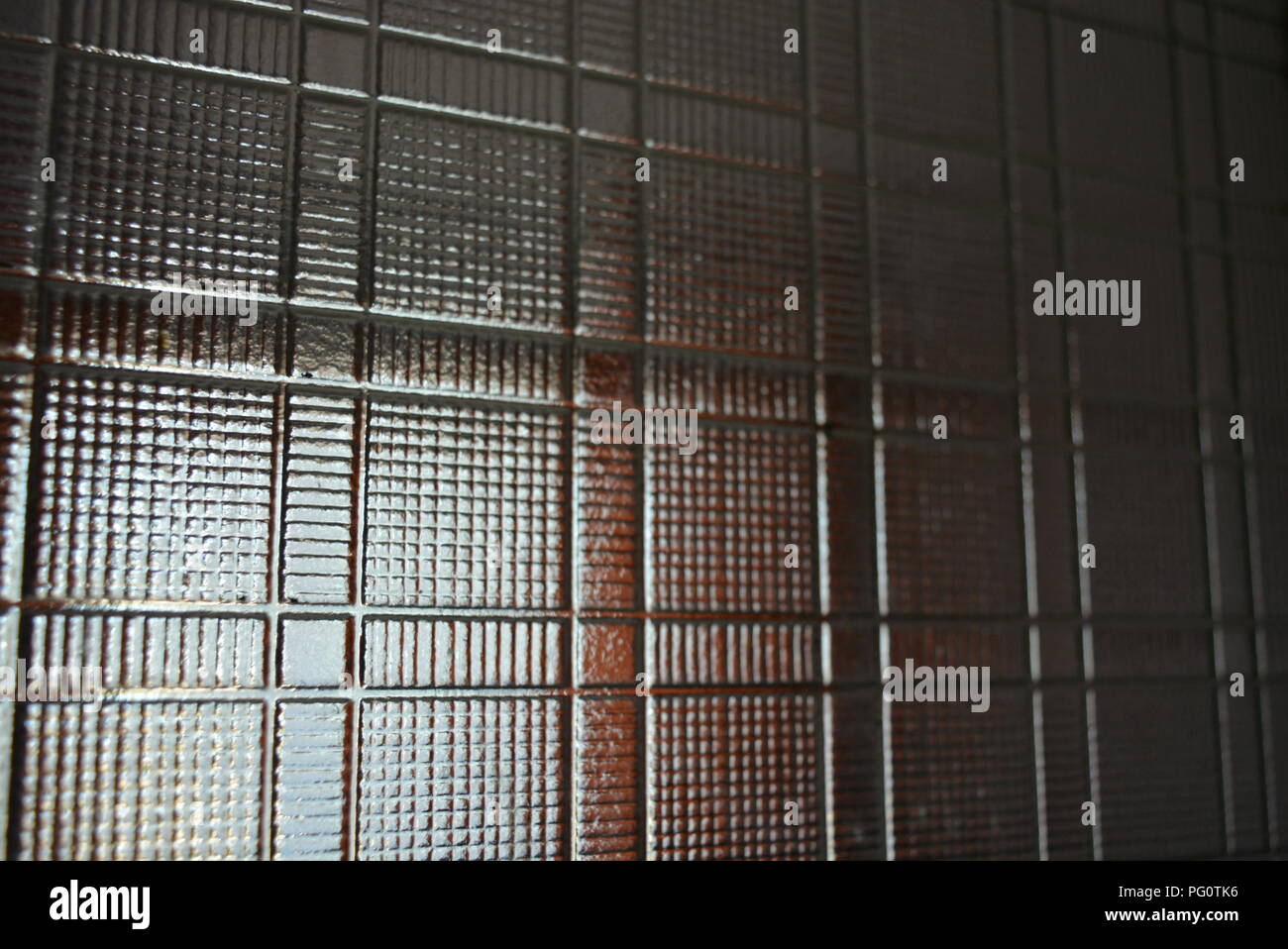 Glass dented background in the form of square wafers, squares and ...