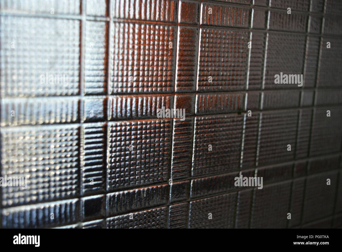 Glass dented background in the form of square wafers, squares and ...