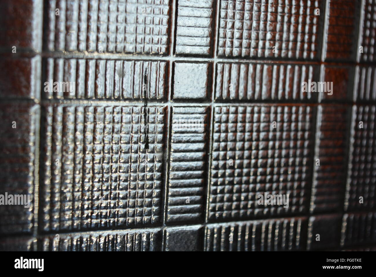 Glass dented background in the form of square wafers, squares and ...