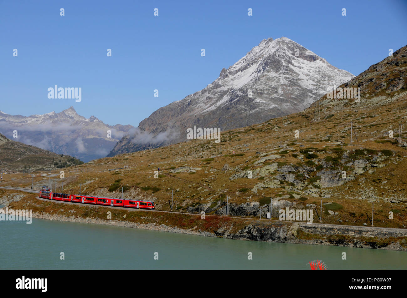 Unesco world heritage train-trip: The Bernina-Train is curving through ...