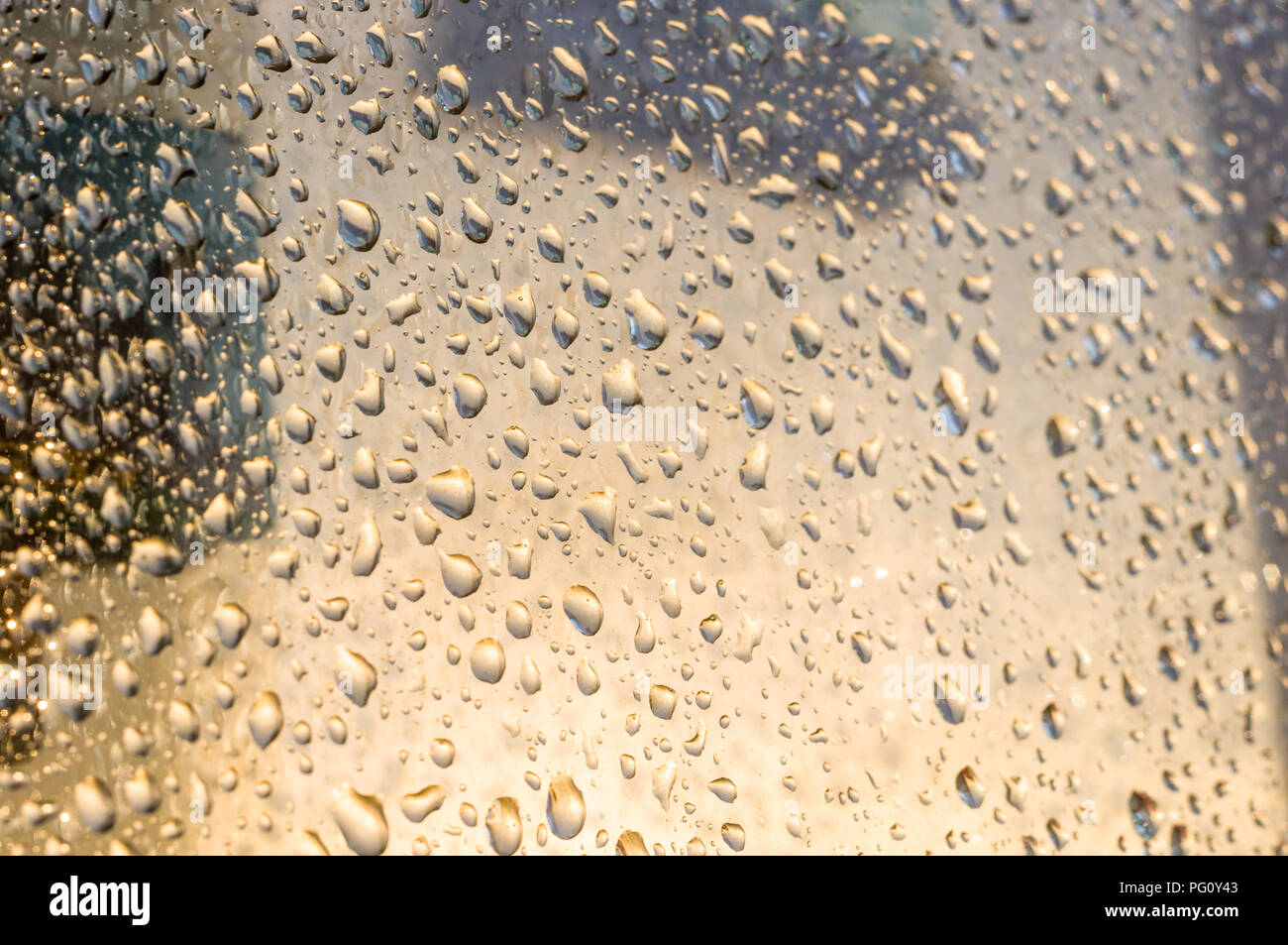 background of raindrops on window glass, close-up Stock Photo - Alamy