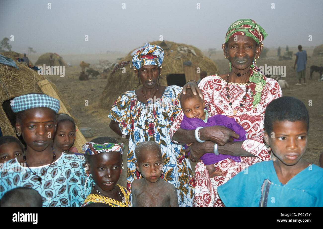 Close-up of women and children at a Fulani encampment in Mopti, Mali ...