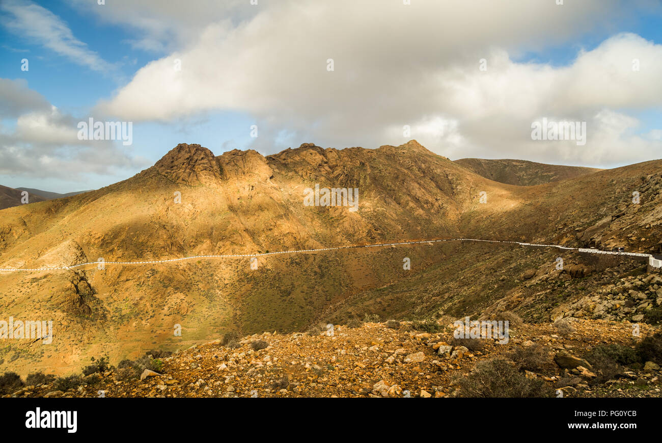Rocky hill landscape with winding road in Fuerteventura, Canary Islands ...