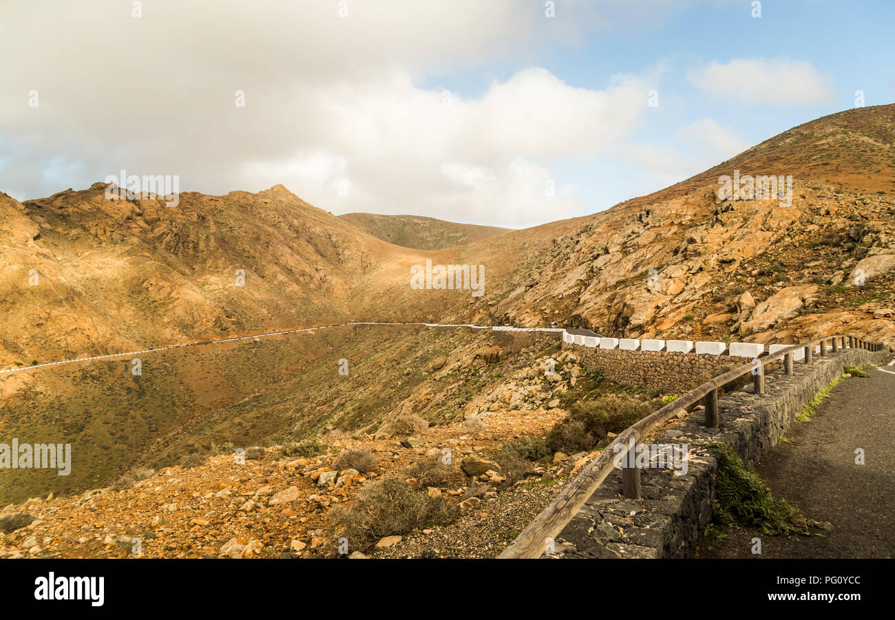 Rocky hill landscape with winding road in Fuerteventura, Canary Islands ...