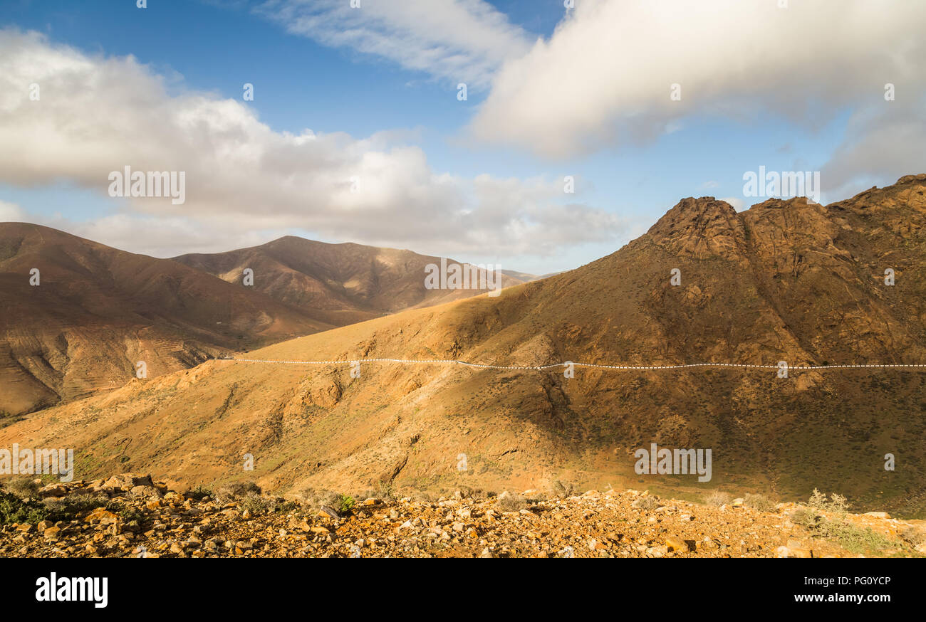 Rocky hill landscape with winding road in Fuerteventura, Canary Islands ...