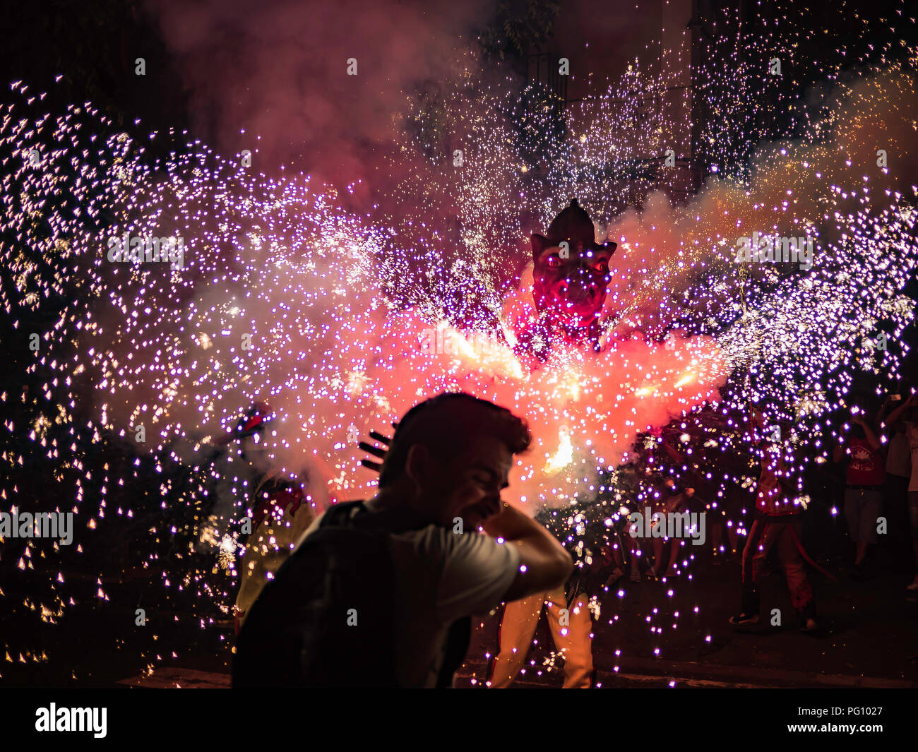 Barcelona, Spain. August 22, 2018 - People celebrating in the Fire Run ...